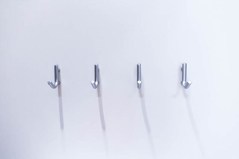 4 Expert Tips on How to Hang Pictures Without Nails | Home Grail