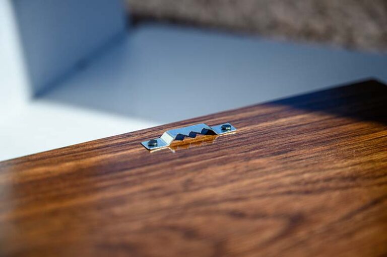 8 Expert Tips on How to Hang a Frame With a Sawtooth Hanger | Home Grail